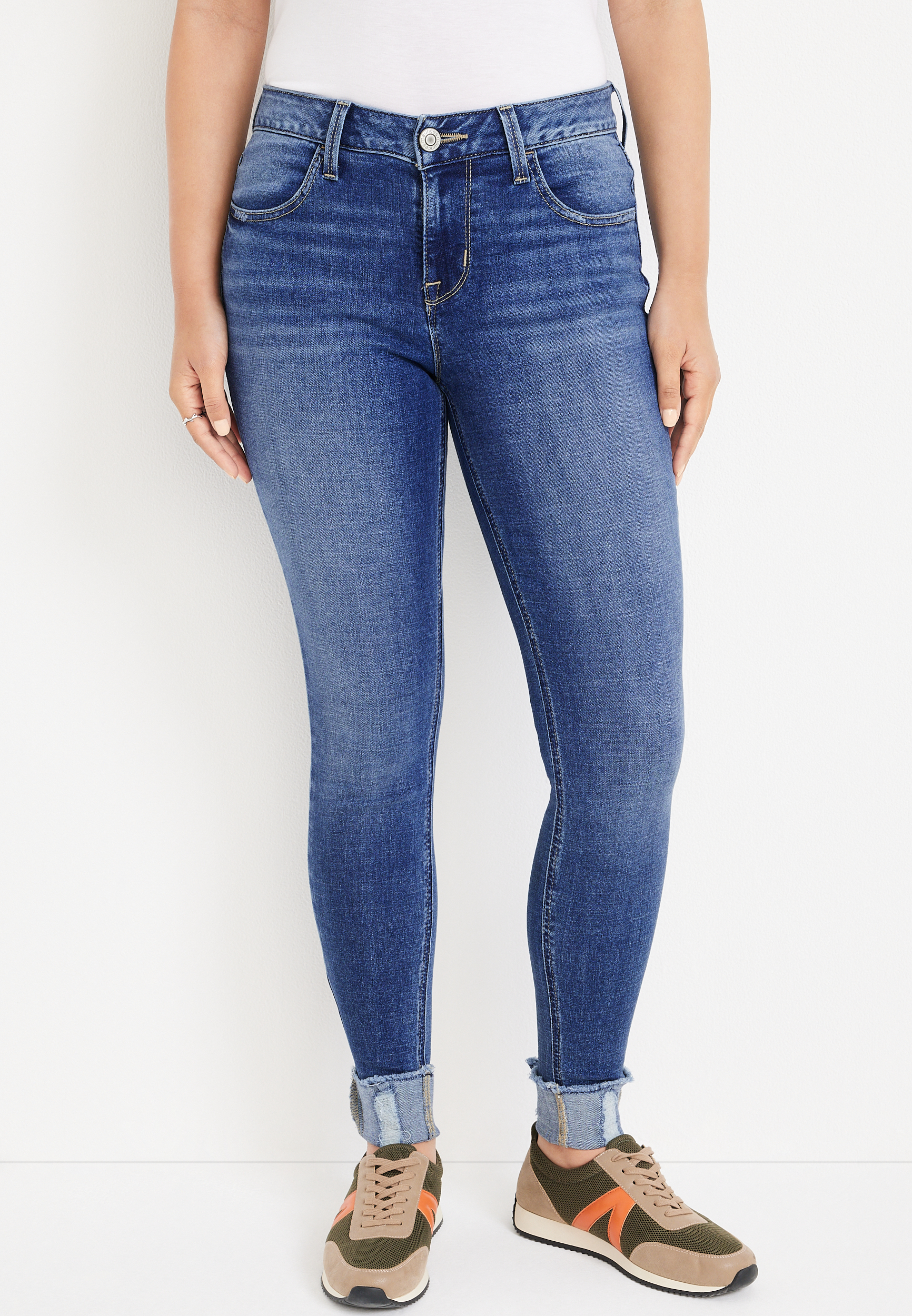 m jeans by maurices™ Mid Rise Frayed Cuffed Jegging | maurices